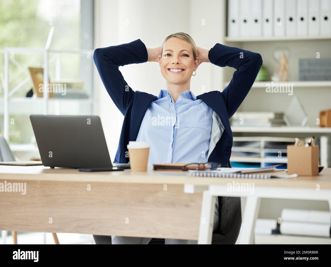 Smiling caucasian woman office desk hi-res stock photography and images ...