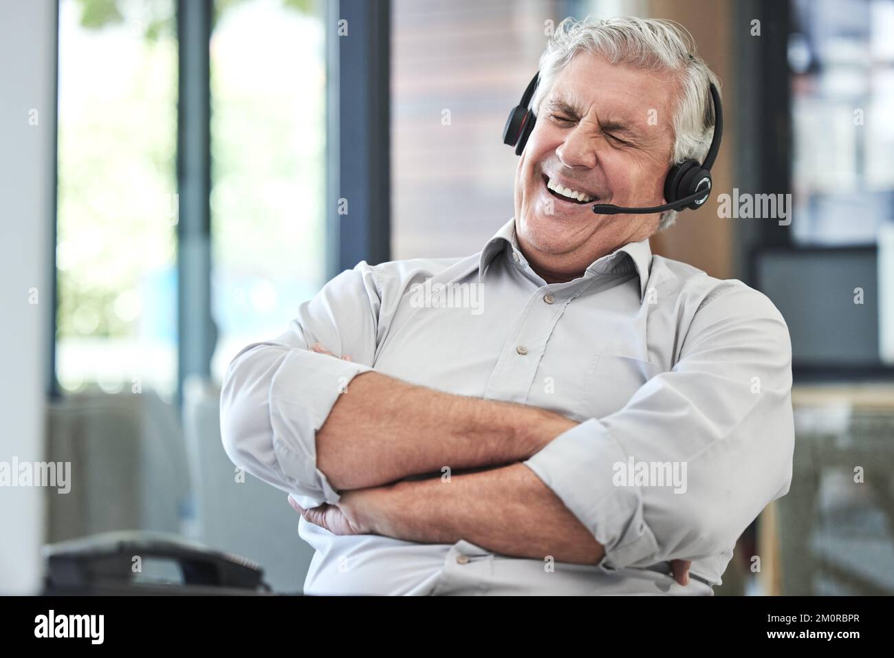 Laughing At A Call Center Employees
