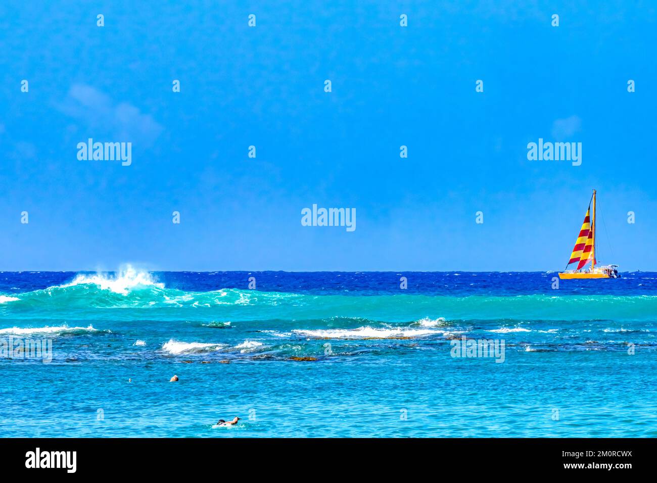 Colorful Red Yellow Sailboat Swimmers Blue Water Waikiki Beach Honolulu ...