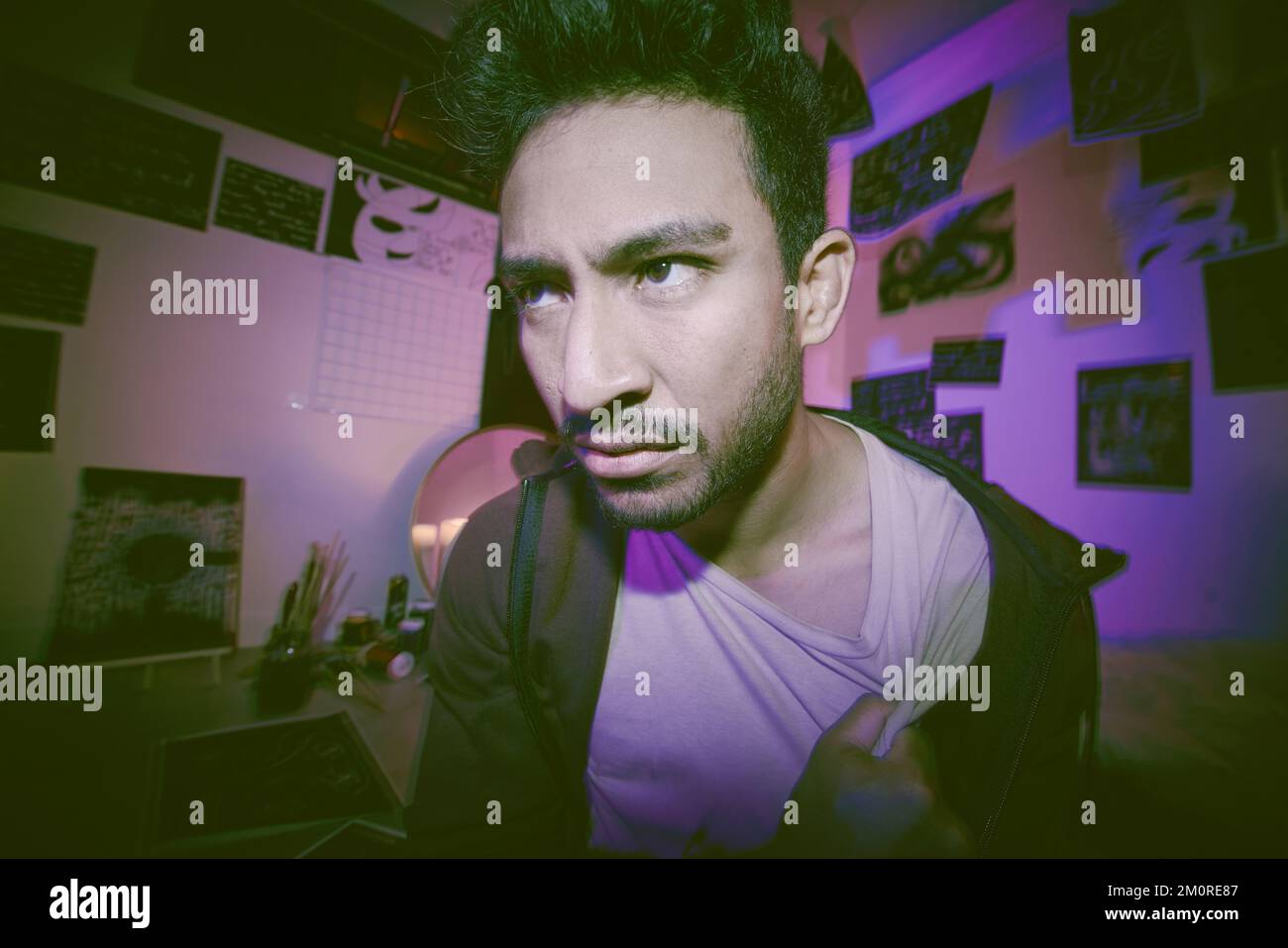 Asian man with mental disorder sitting alone at night feeling paranoid ...