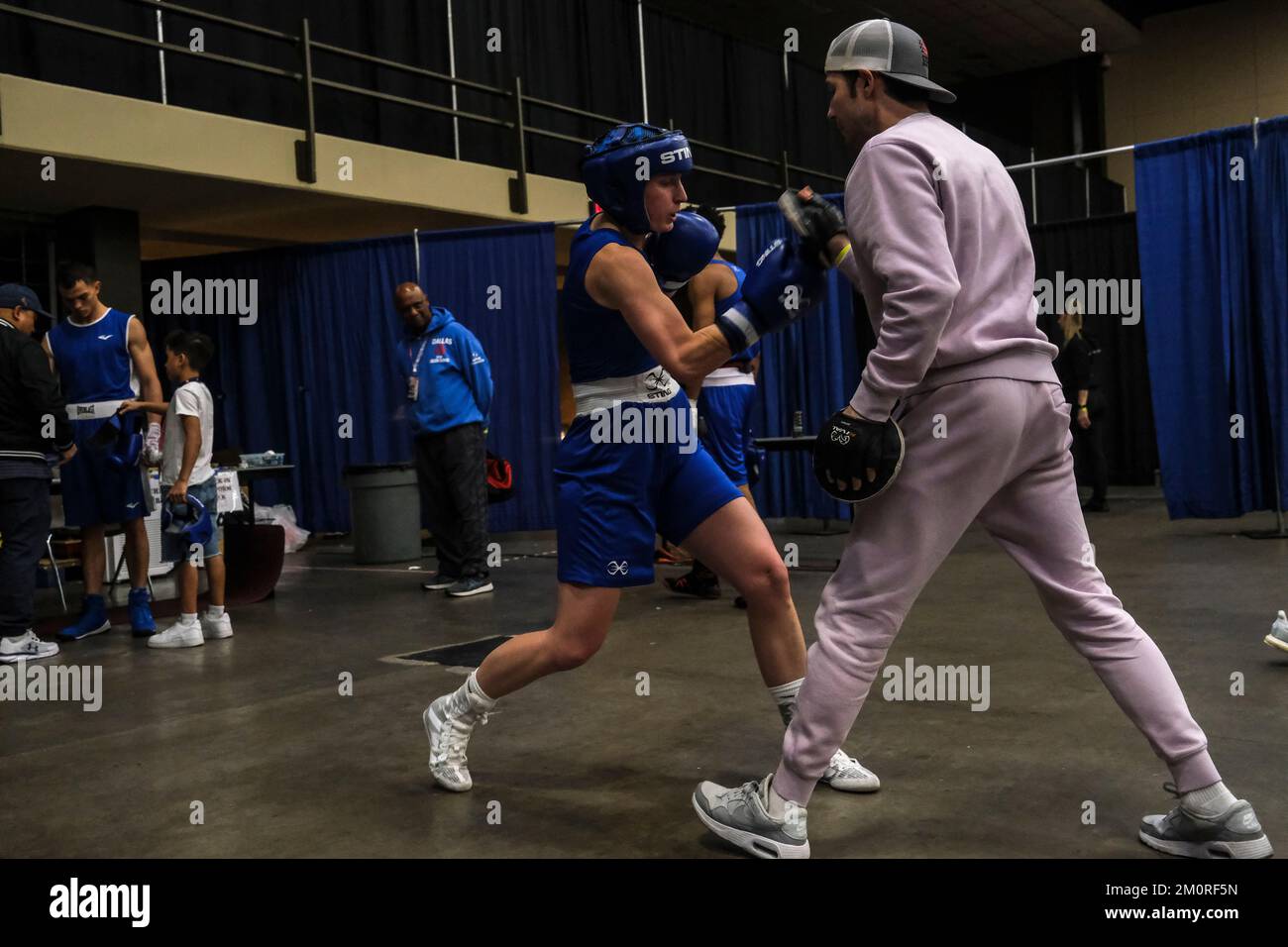Lubbock, TX, USA. 7th Dec, 2022. Boxers prepare in the waiting area ...