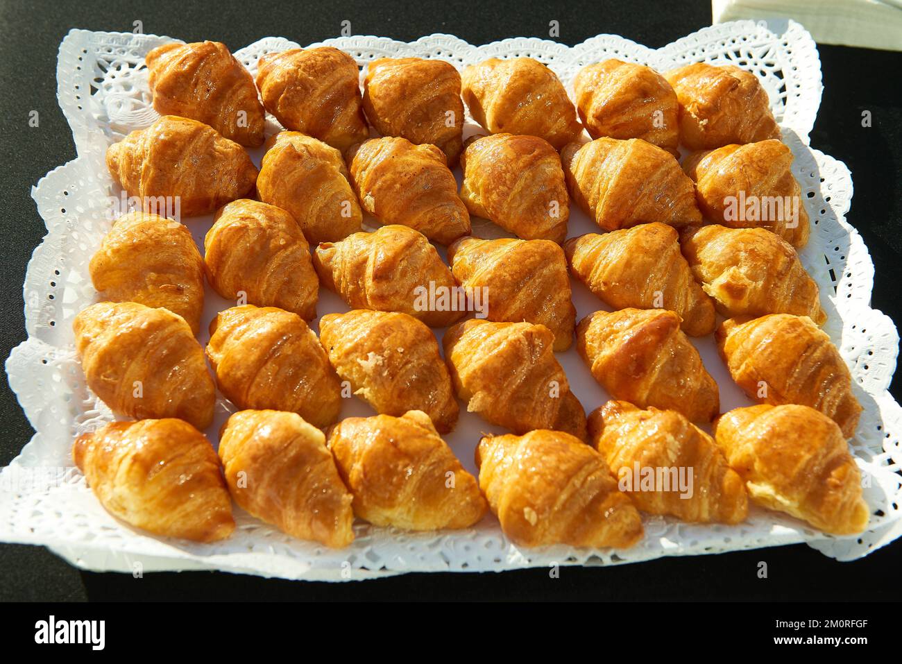 View of many sweets mini-croissants on plate Stock Photo - Alamy