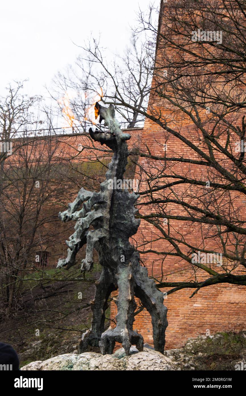 Legendary Wawel Dragon Statue breathing fire royal castle in Krakow in ...