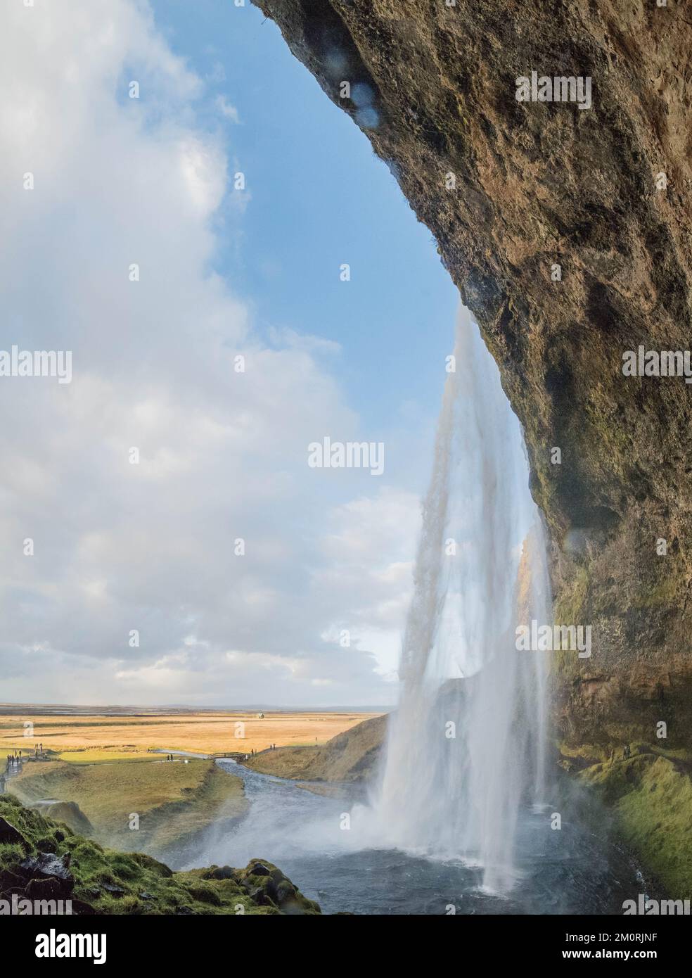 A flowing waterfall from rocks Stock Photo - Alamy