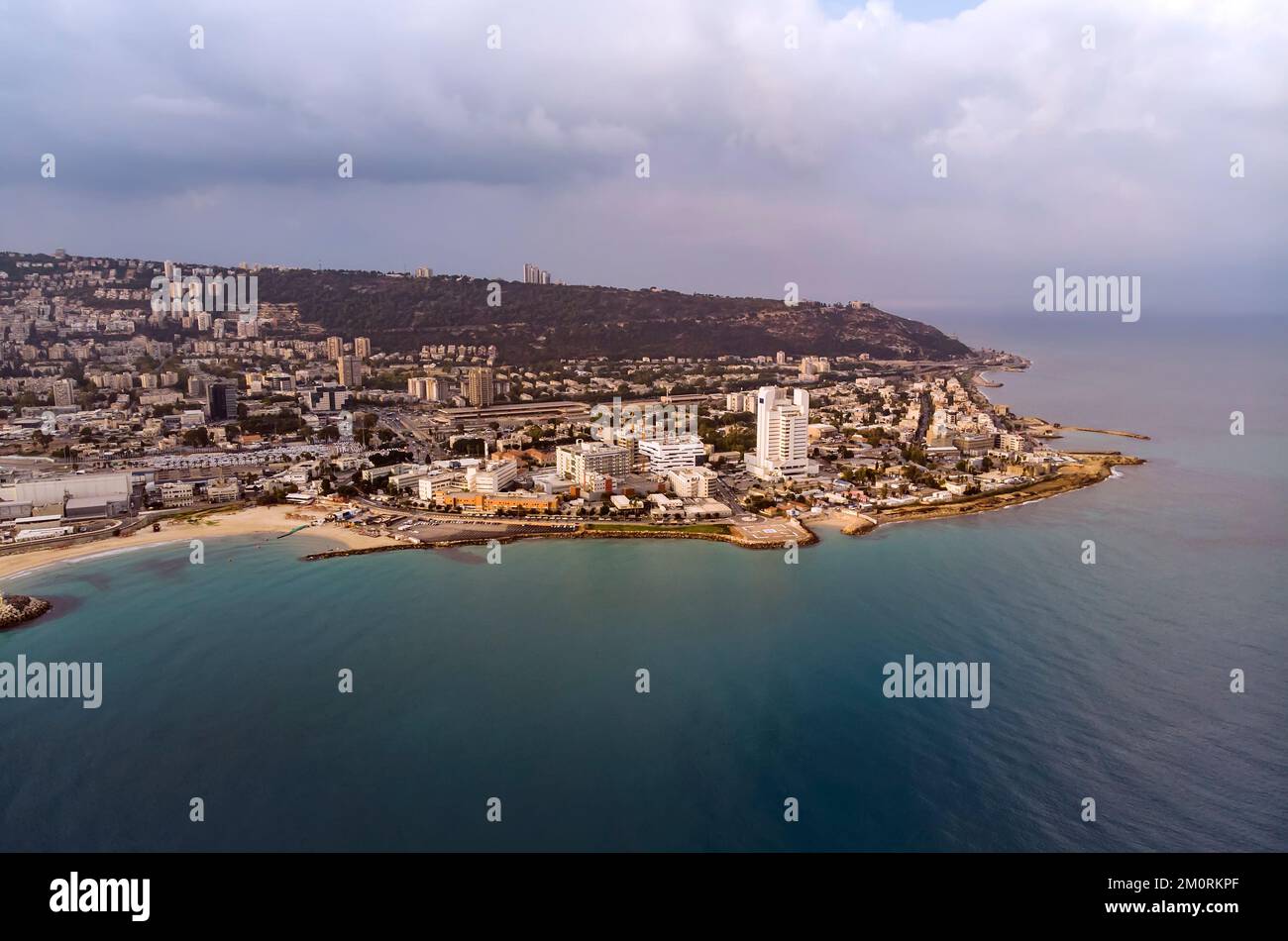 Aerial view of new modern buildings at sea coastline near sand beach ...