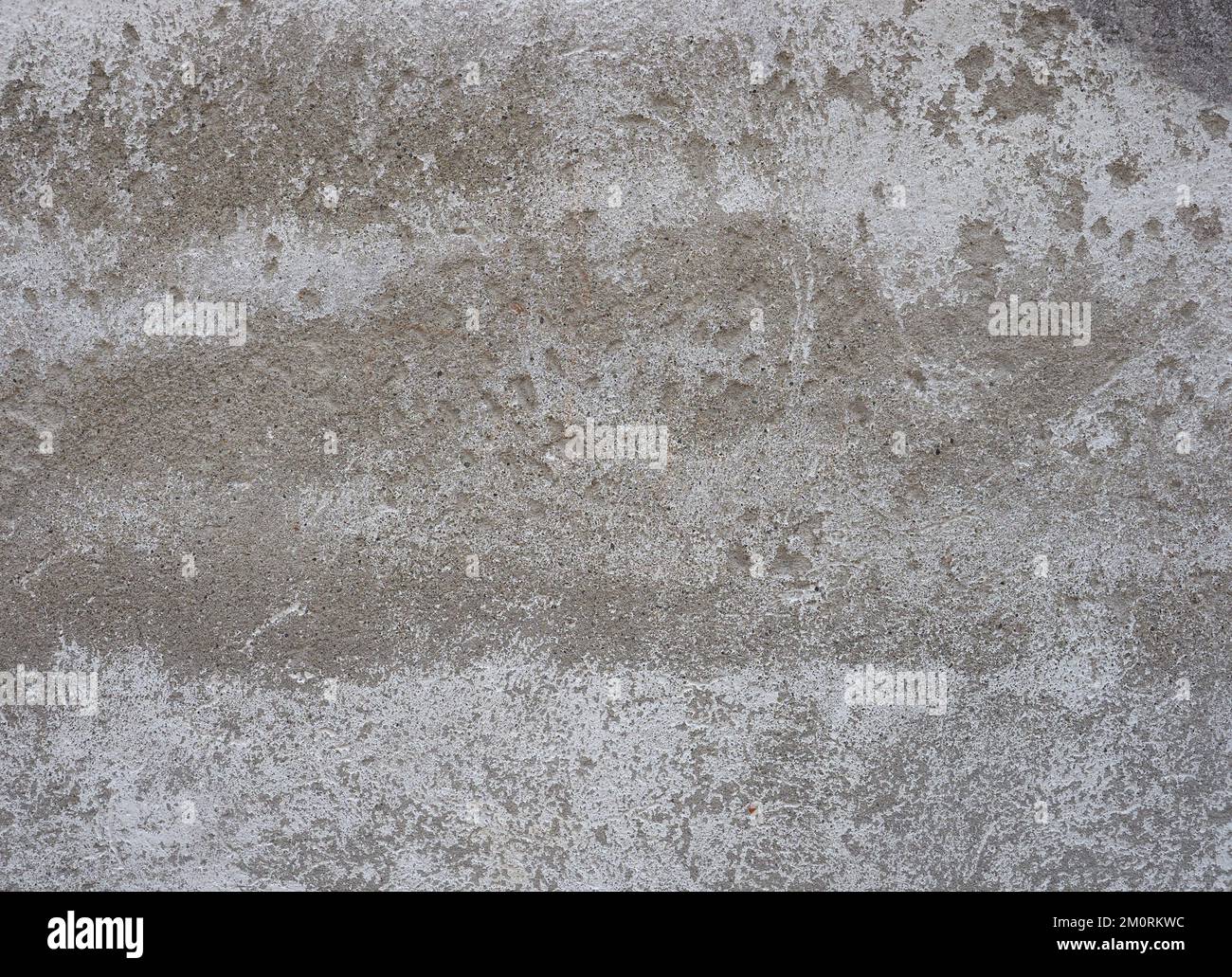 plaster peeling off a damaged wall surface Stock Photo - Alamy
