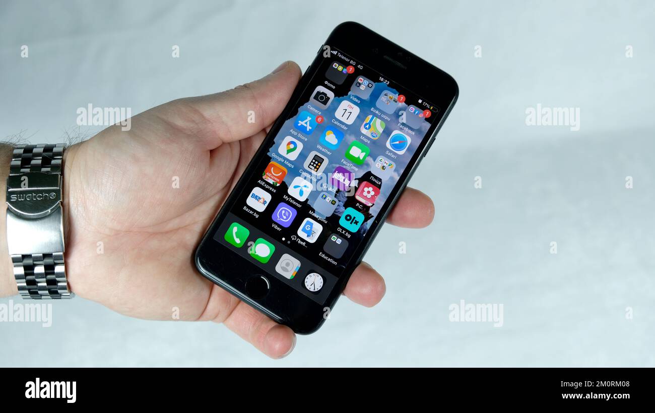 Hand holding iphone white background hi-res stock photography and ...
