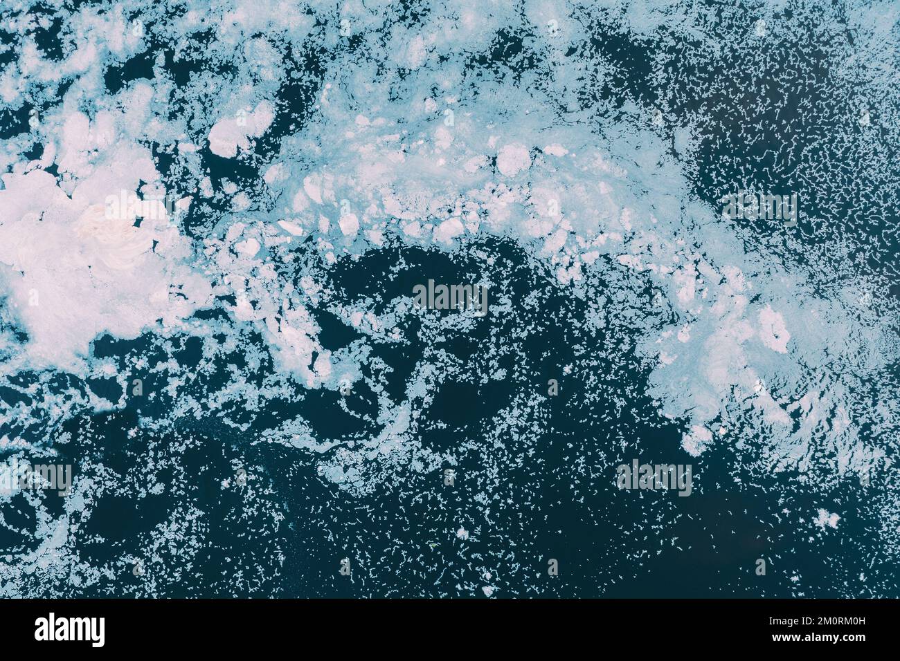 Natural background of ice on the river. Textured cold frosty surface of ...