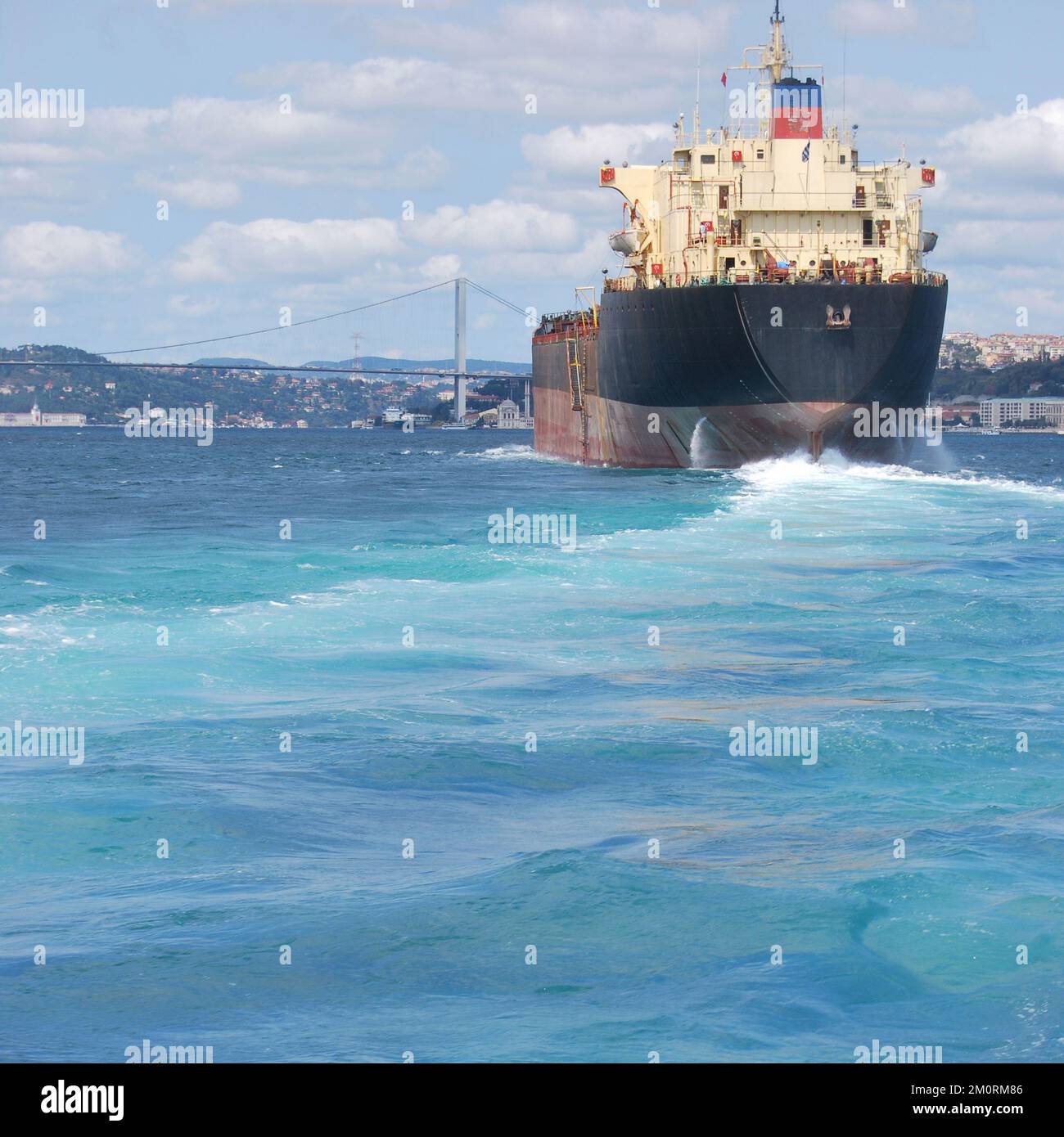 Large cargo ship, cargo ship carrying containers, engaged in ...