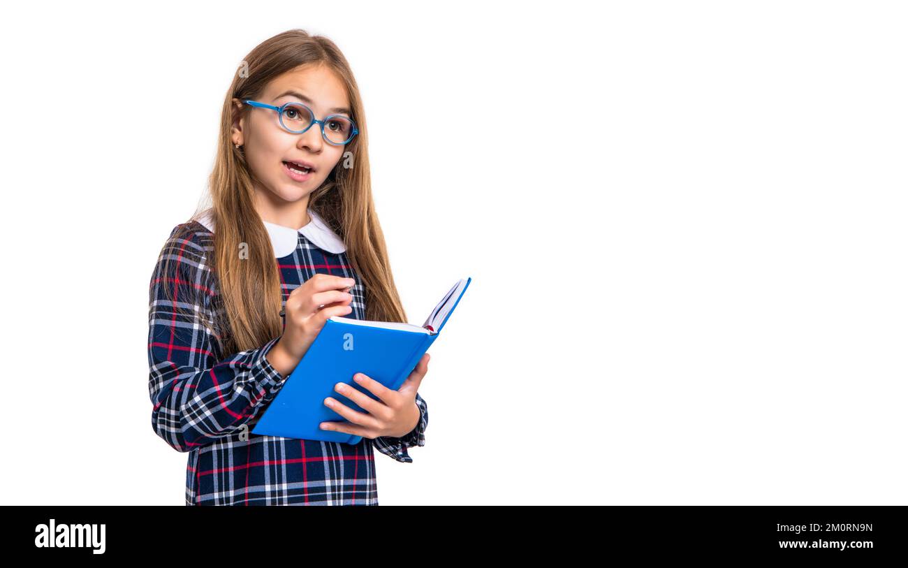 amazed school girl in noting notes isolated on white background. school ...