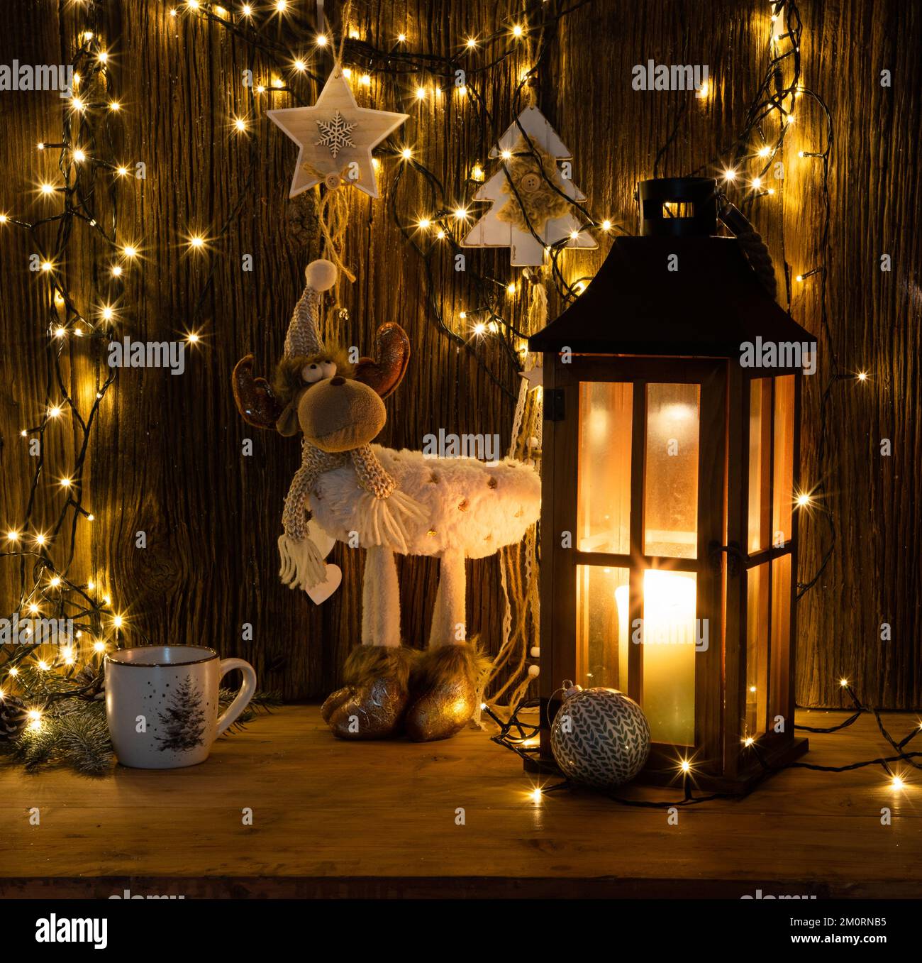 christmas lights and decorations on wooden background Stock Photo - Alamy