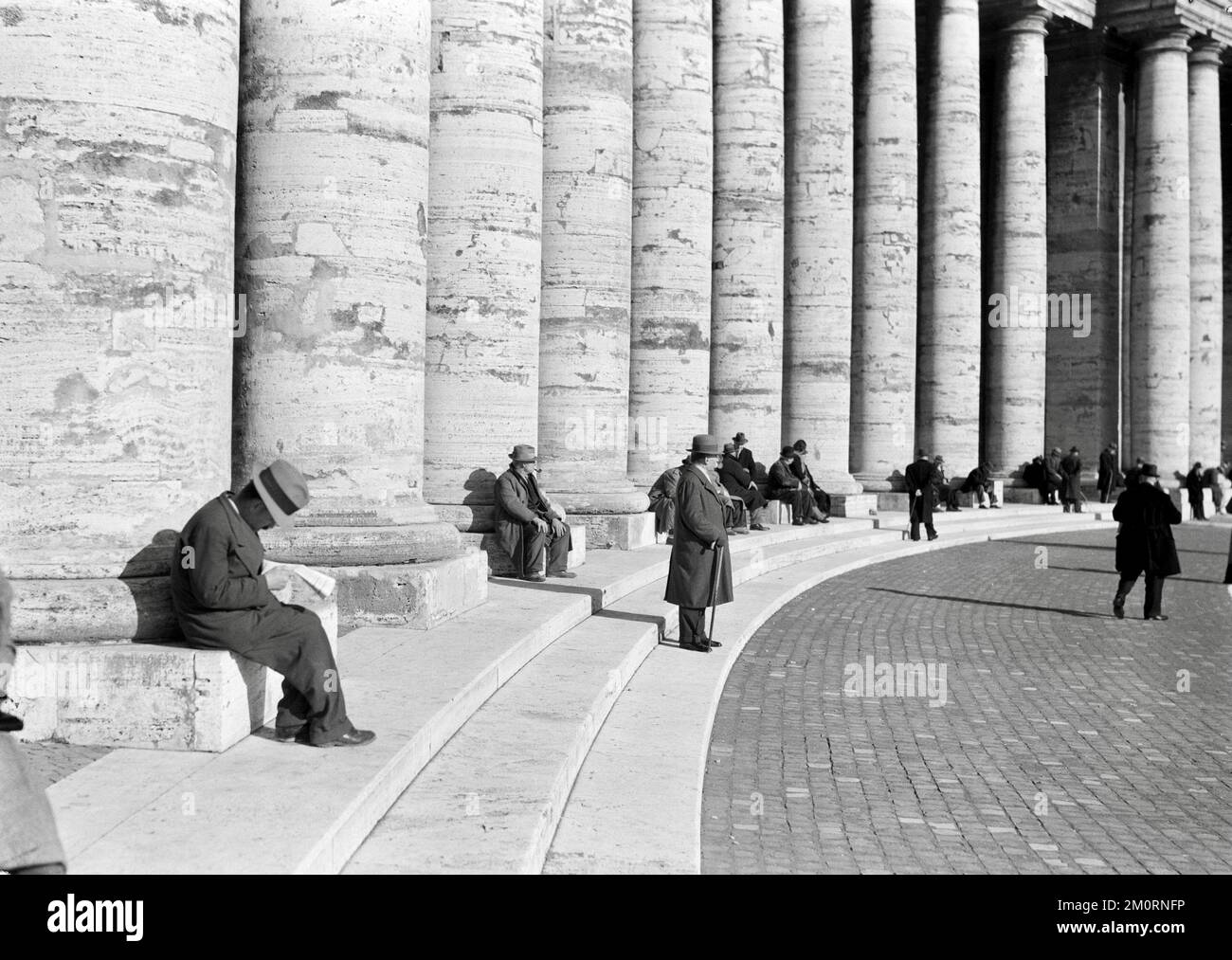 Willem van de Poll - Part of the colonnade where men sit on the base of ...