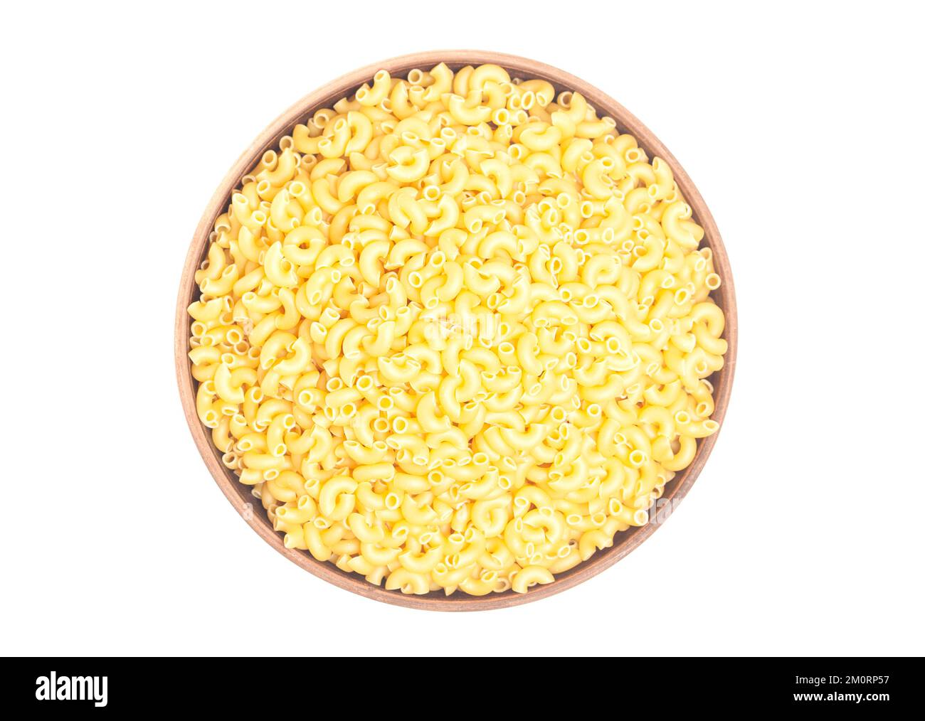 Italian pasta in brown clay bowl isolated on white background. Top view ...