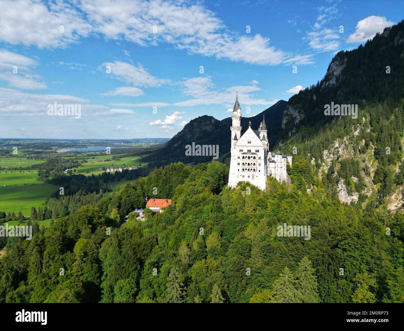 Neuschwanstein Castle Germany drone aerial view sunny day blue sky ...