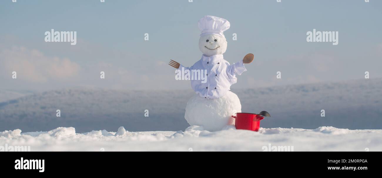 Snow man cook chef on the snow outdoor background. Christmas banner ...