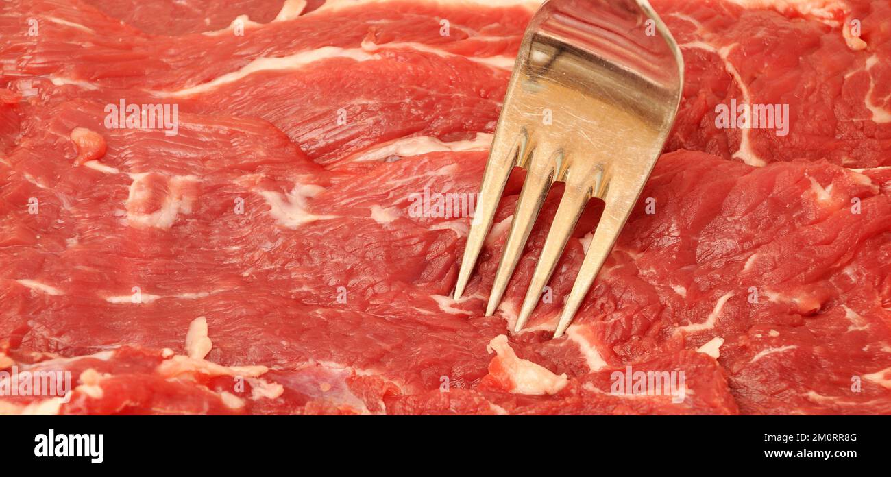 Clean very fresh red raw meat beef and fork, red cow meat texture Stock ...