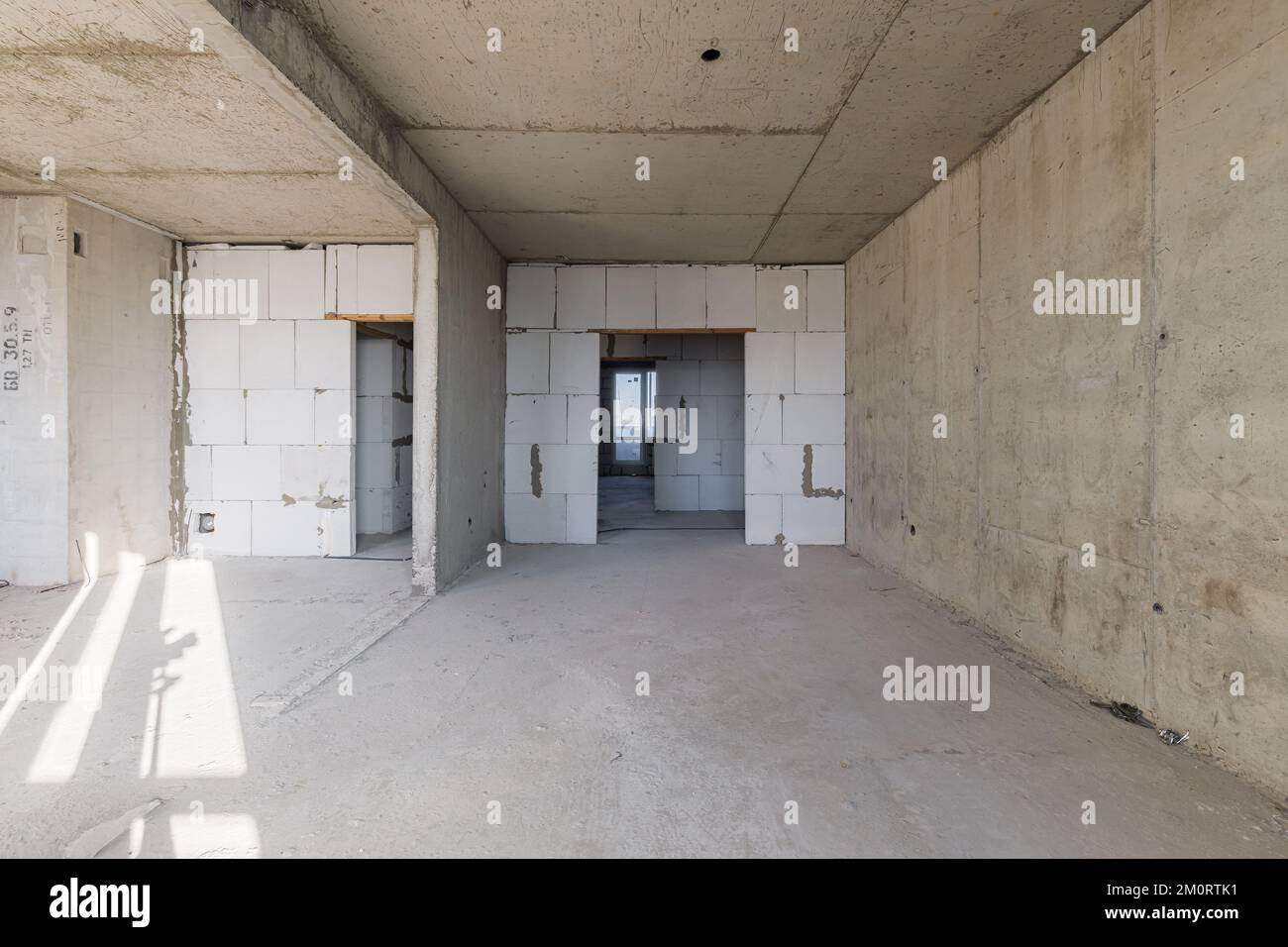 Empty concrete commercial space without finishing with partitions Stock ...