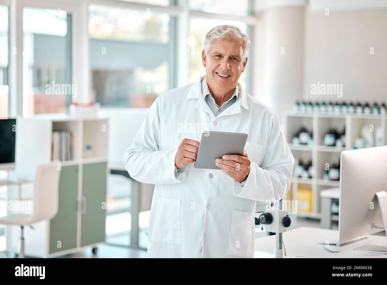 The results are quite fascinating. Portrait of a senior scientist using ...