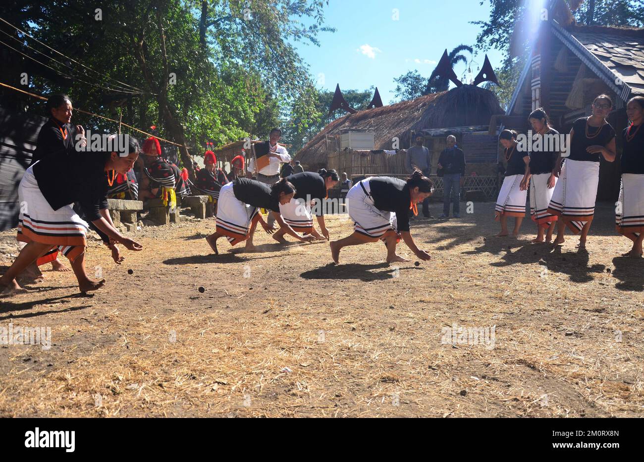Kohima, India. 8th Dec, 2022. Naga tribesman from Ao tribe performs a ...