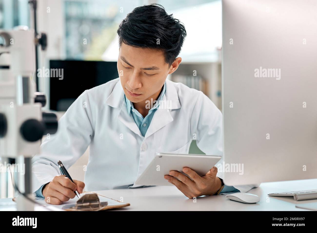 Science is about asking and answering. a young scientist using a ... Science is about asking and answering. a young scientist using a ...