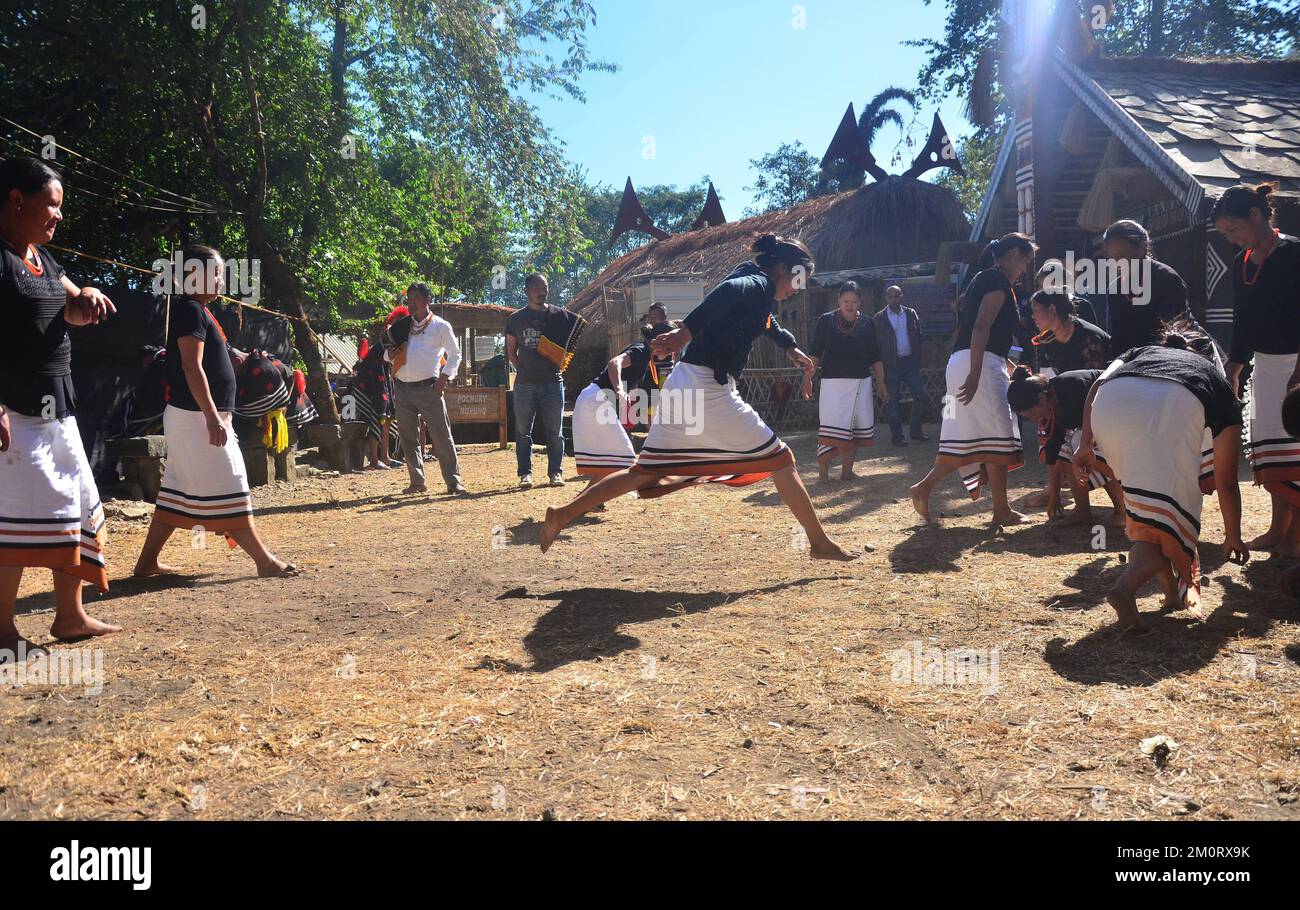 Kohima, India. 8th Dec, 2022. Naga tribesman from Ao tribe performs a ...