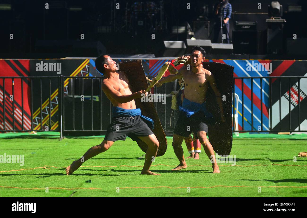 Kohima, India. 08th Dec, 2022. Naga tribesman from Ao tribe performs a ...