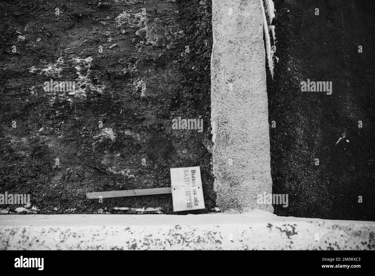 Sign on sidewalk in Black and White Stock Photos & Images - Alamy