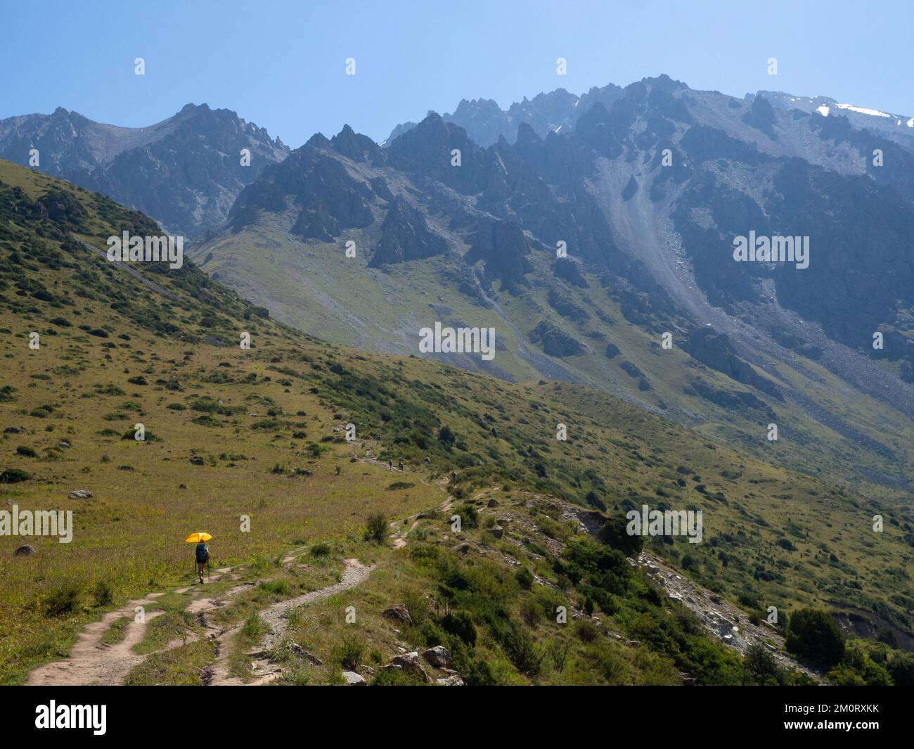 An aerial view of a person hiking in the mountains Stock Photo - Alamy