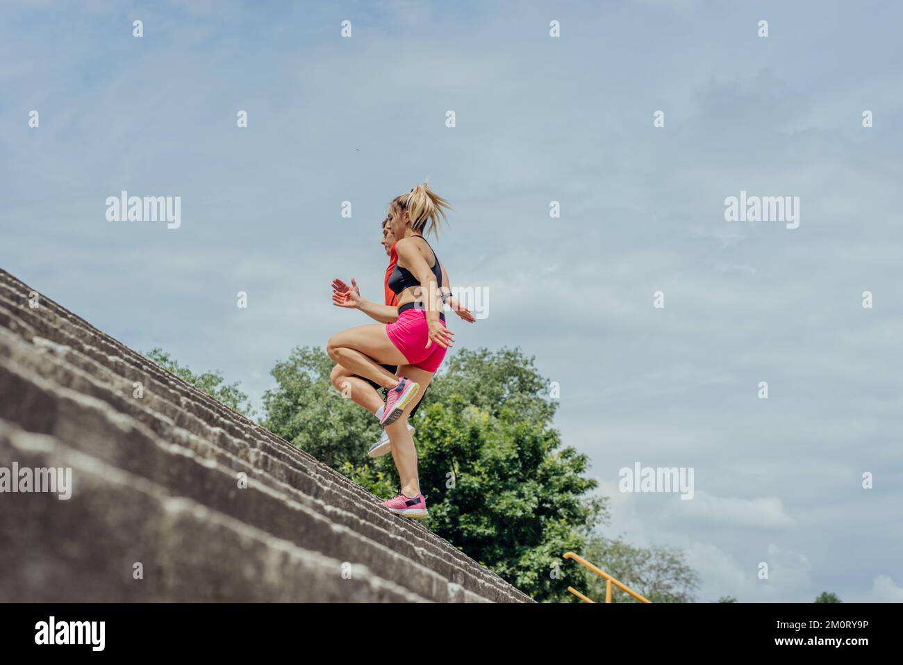 Urban couple sprinting hi-res stock photography and images - Alamy