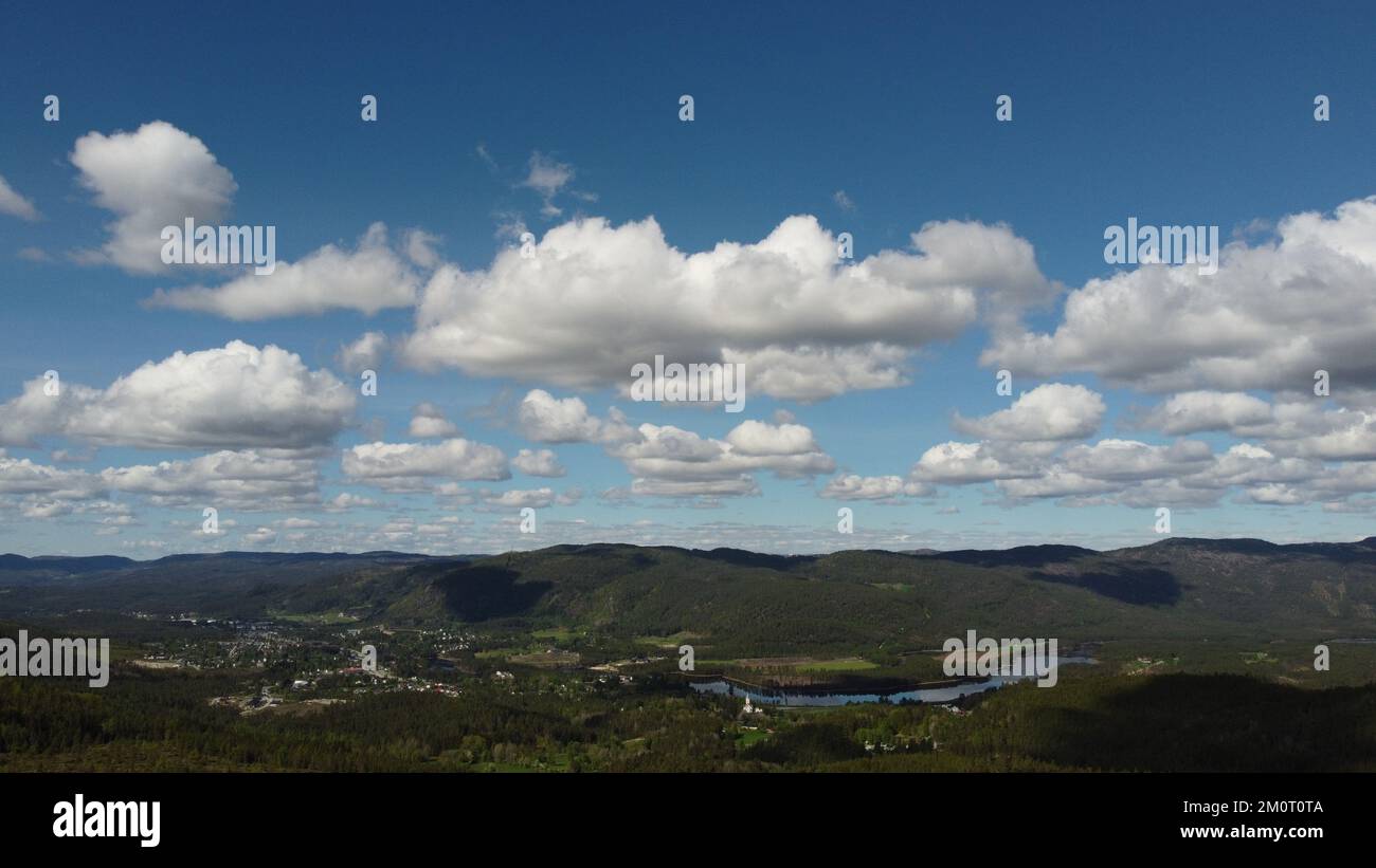 An aerial landscape of a forested hillside on a sunny day Stock Photo ...