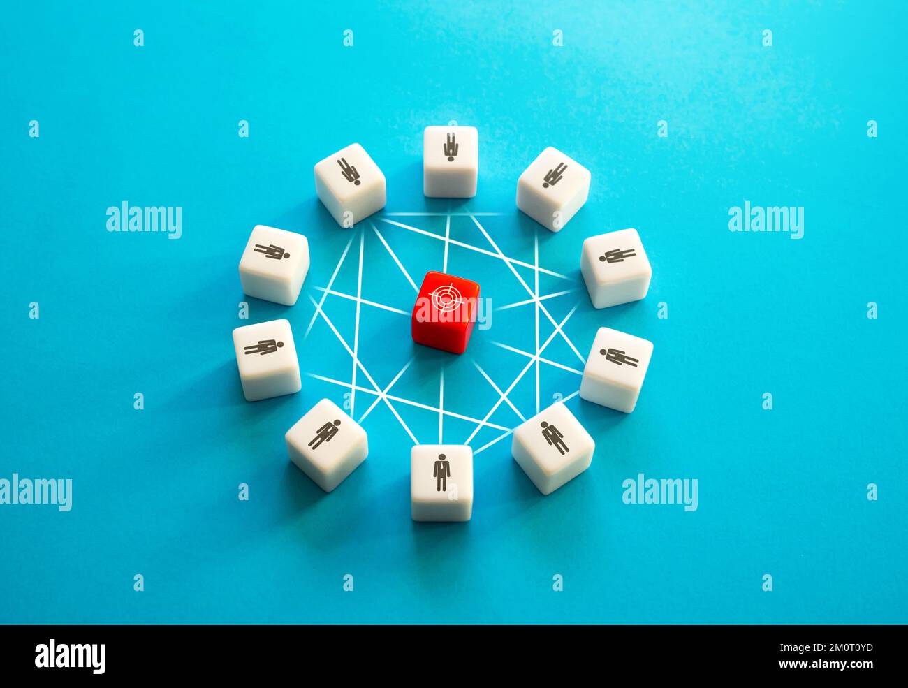 The team cooperates around the goal. Joint efforts on difficult work ...