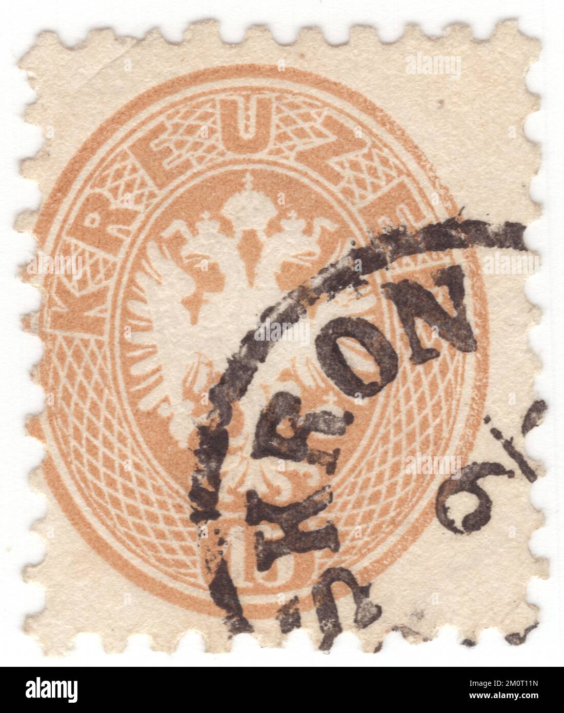 AUSTRIA — 1863: An 15 kreuzer yellow-brown postage stamp depicting Coat ...