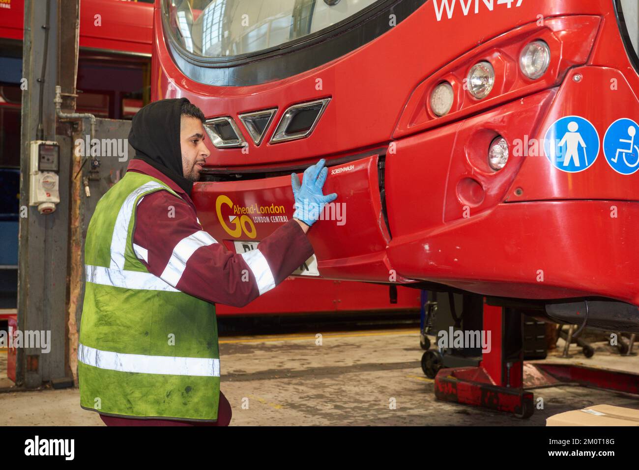 EDITORIAL USE ONLY Service engineer Bruno Antonio works on a bus that ...