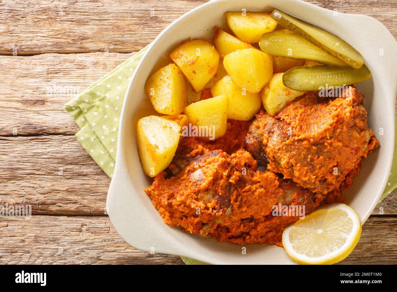 Macanese African Chicken Galinha a Africana close up on the pot on the ...