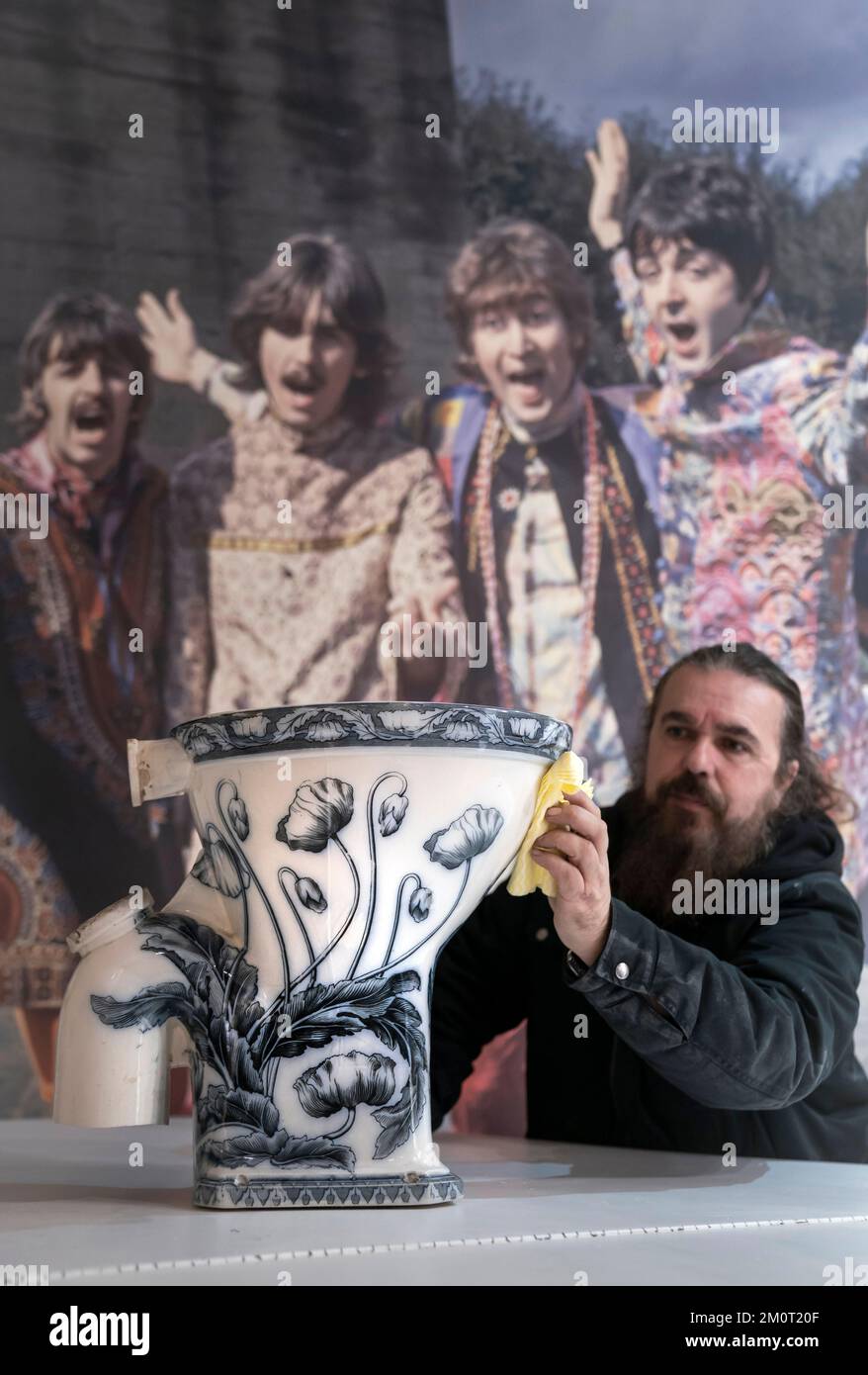 Roag Best gives a final polish to John Lennon's toilet from his ...