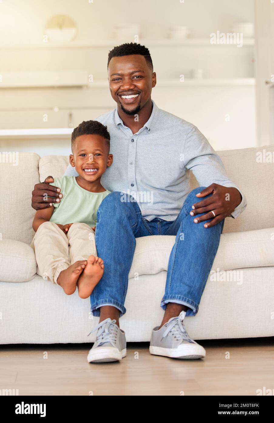 Young happy content african american father bonding and relaxing with ...