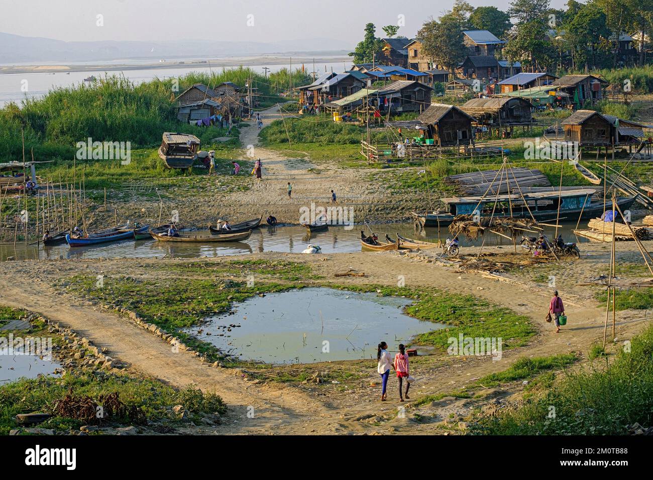 Burma, Myanmar, Mandalay, village along the banks of Irrawady river ...