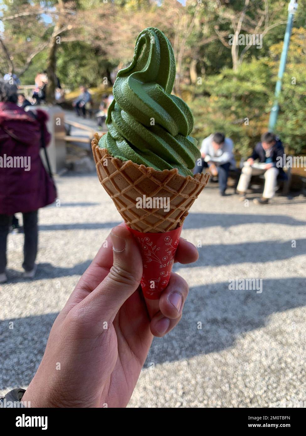 Japanese matcha green ice cream cone in a hot day Stock Photo - Alamy
