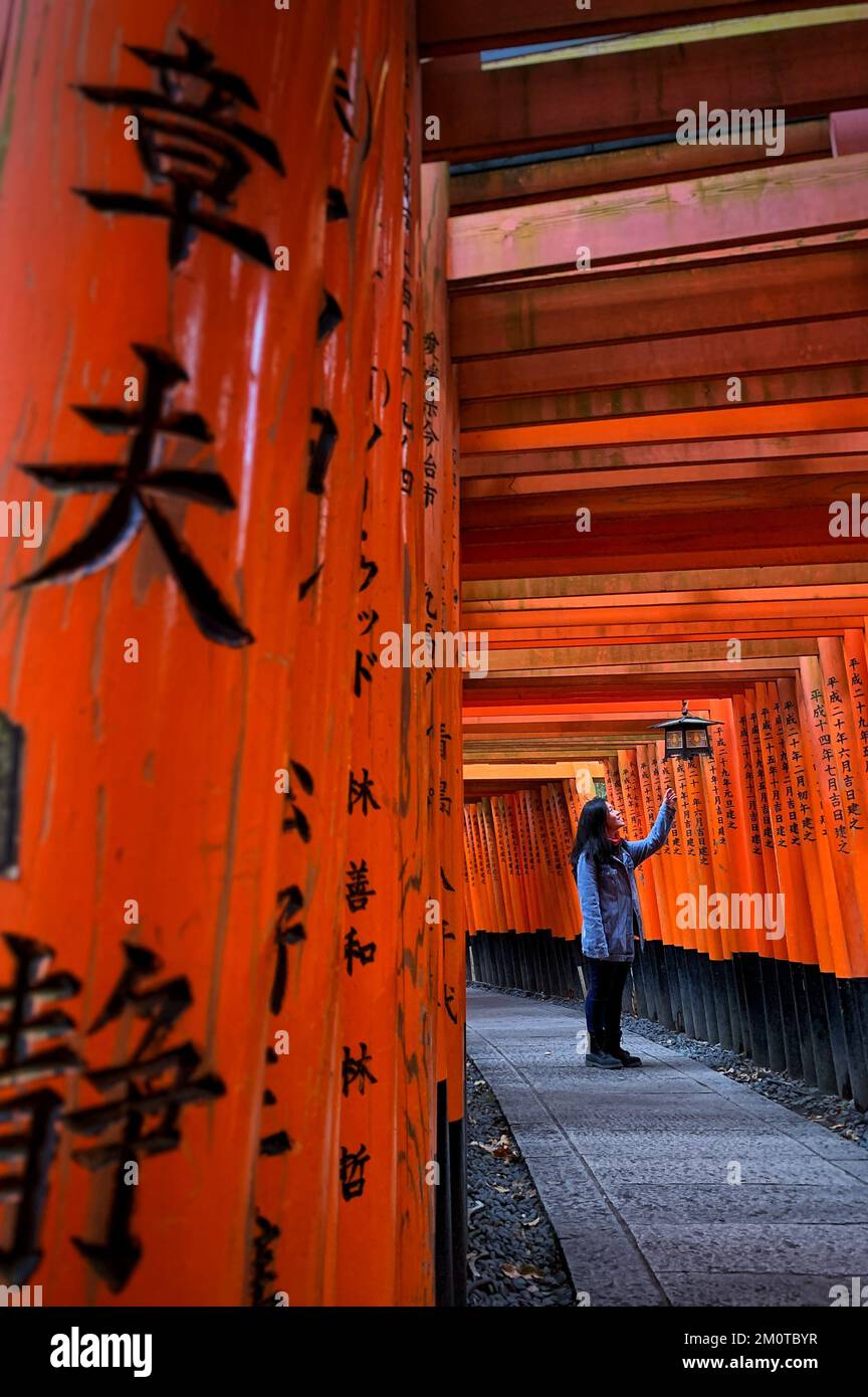 Torii gate in Japan with writings Stock Photo - Alamy