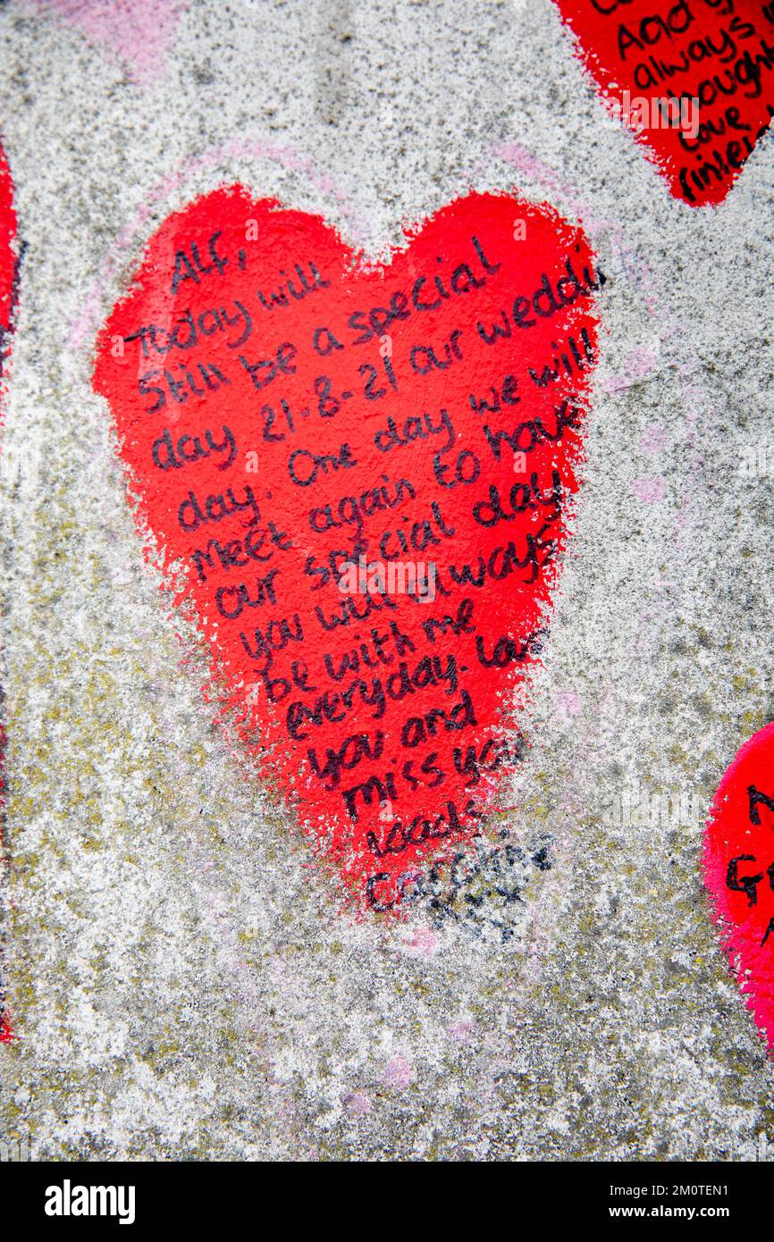 London, Lambeth, The Covid-19 London memorial wall with hearts hand ...