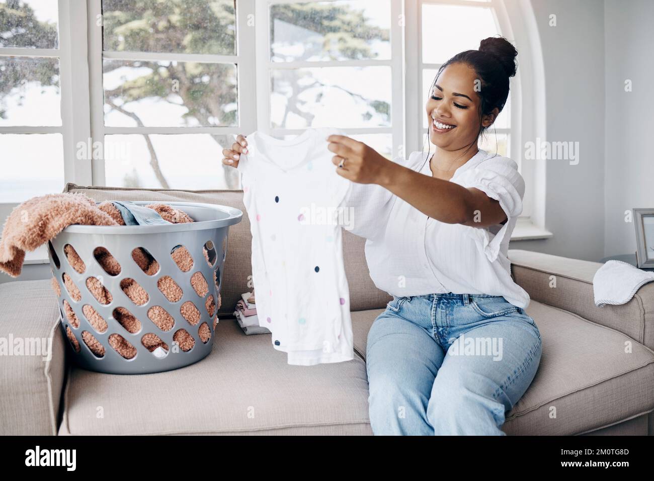This is my favourite shirt. an attractive young woman sitting alone in ...