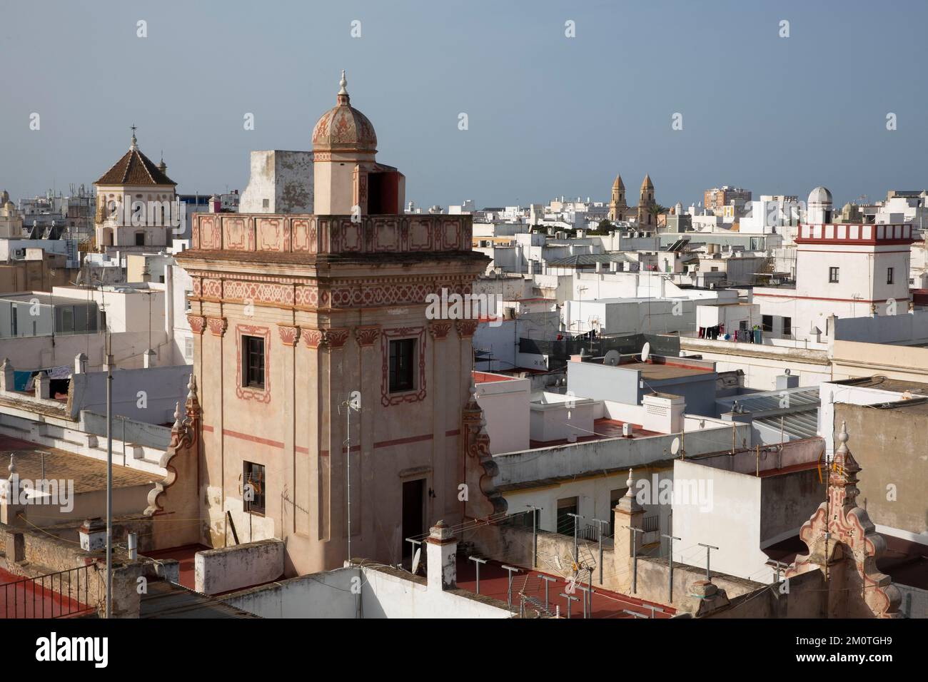 Spain, Andalusia, Cadiz, roofs of the old town from which emerge one of ...