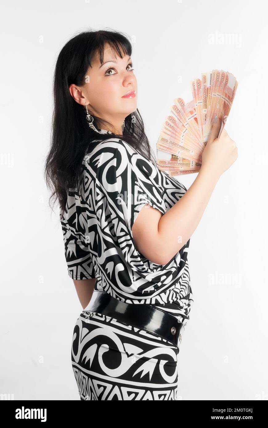Pretty woman with cash Stock Photo - Alamy
