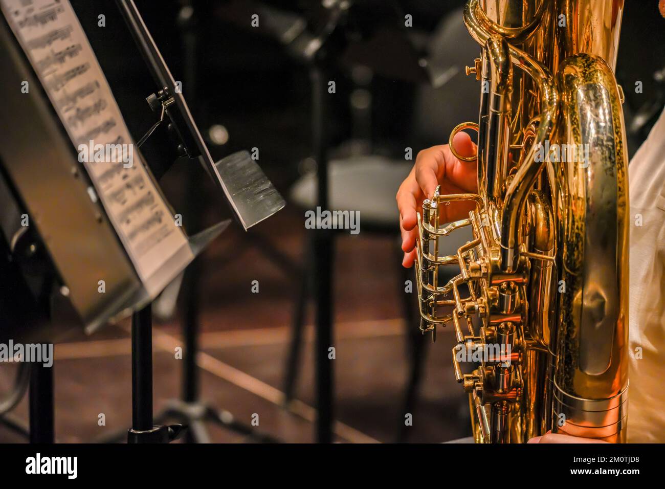The tuba or bass playing inside an orchestra Stock Photo - Alamy