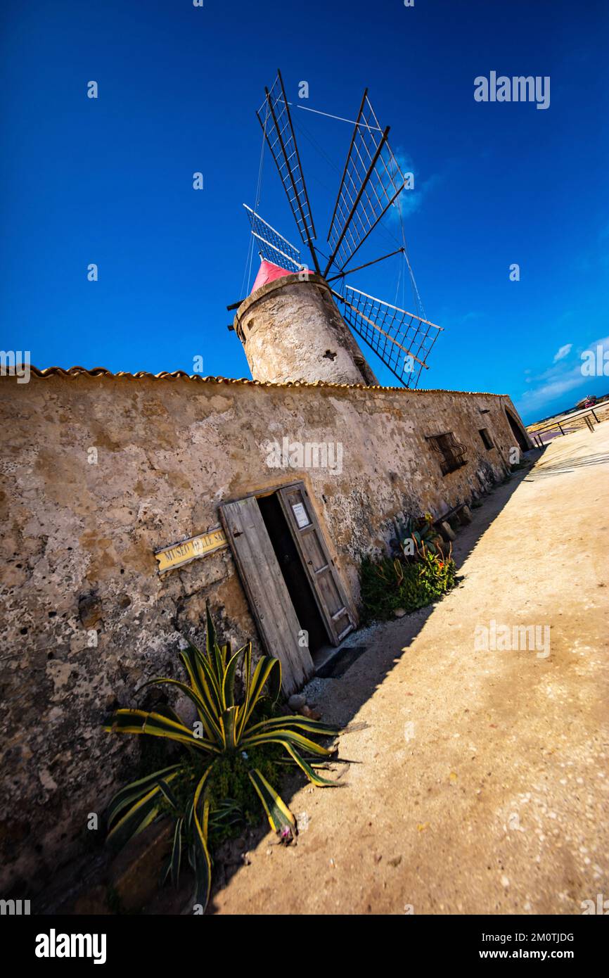 A vertical shot of a windmill at the Salt Museum in Italy Stock Photo ...