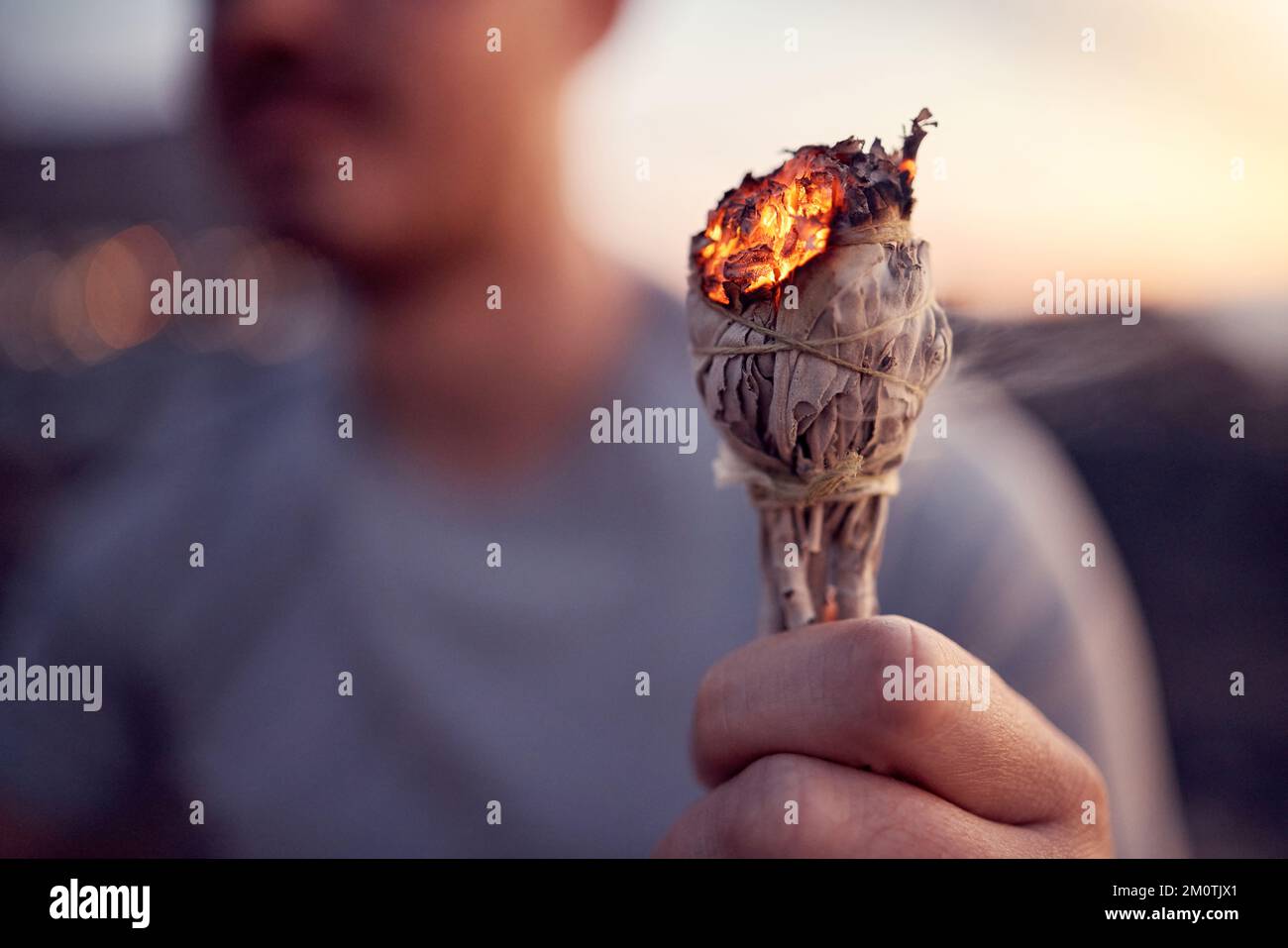 Man, hand and burning sage for a spiritual meditation on the beach at ...