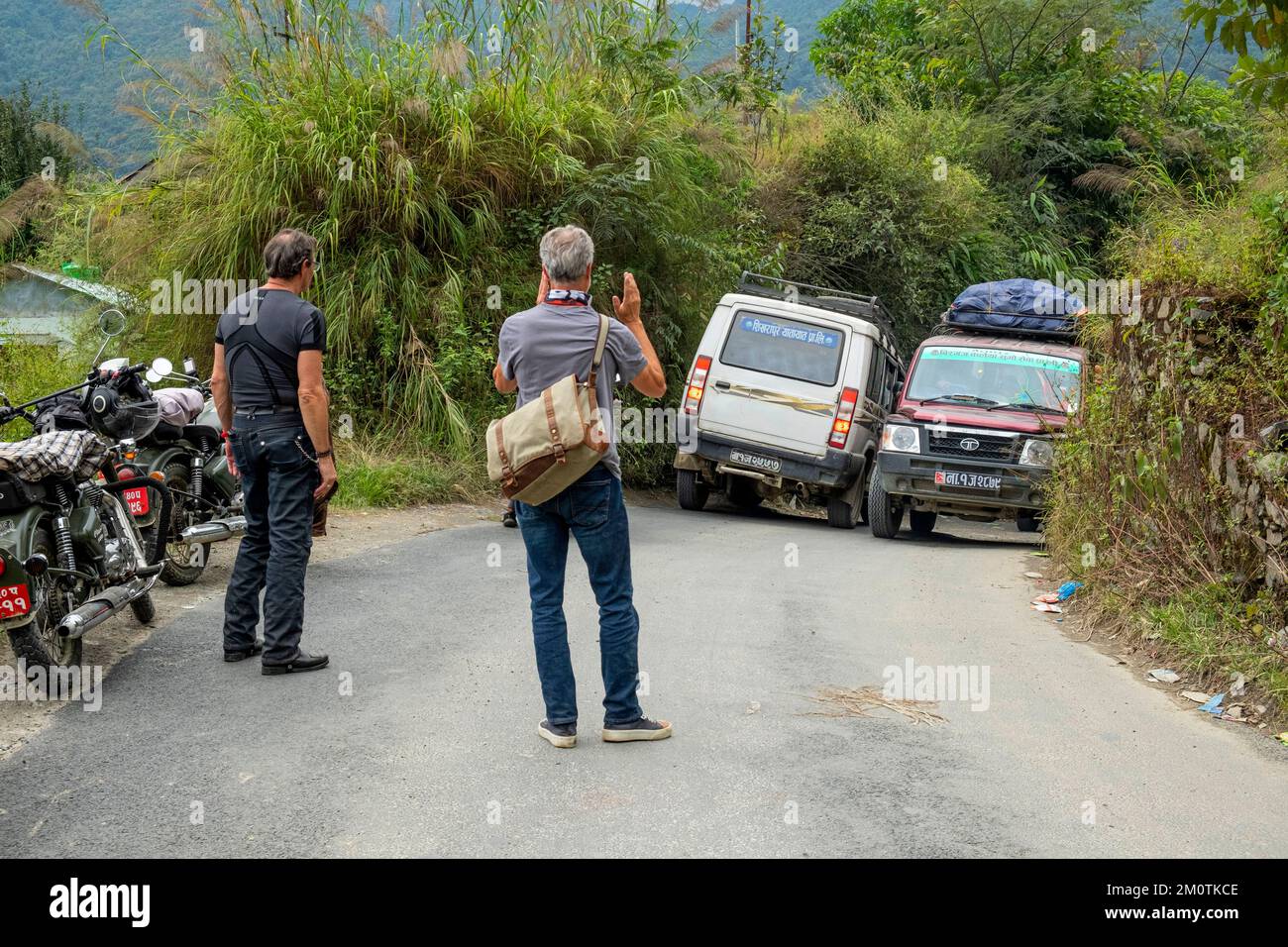 Nepal, national road H02, difficult passage of front vehicles, heavy ...