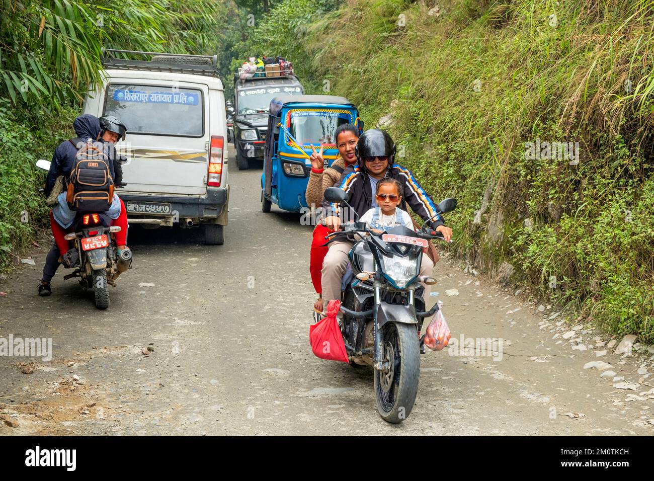 Nepal, national road H02, difficult passage of front vehicles, heavy ...