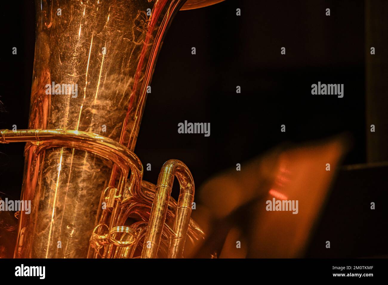 The tuba or bass playing inside an orchestra Stock Photo - Alamy