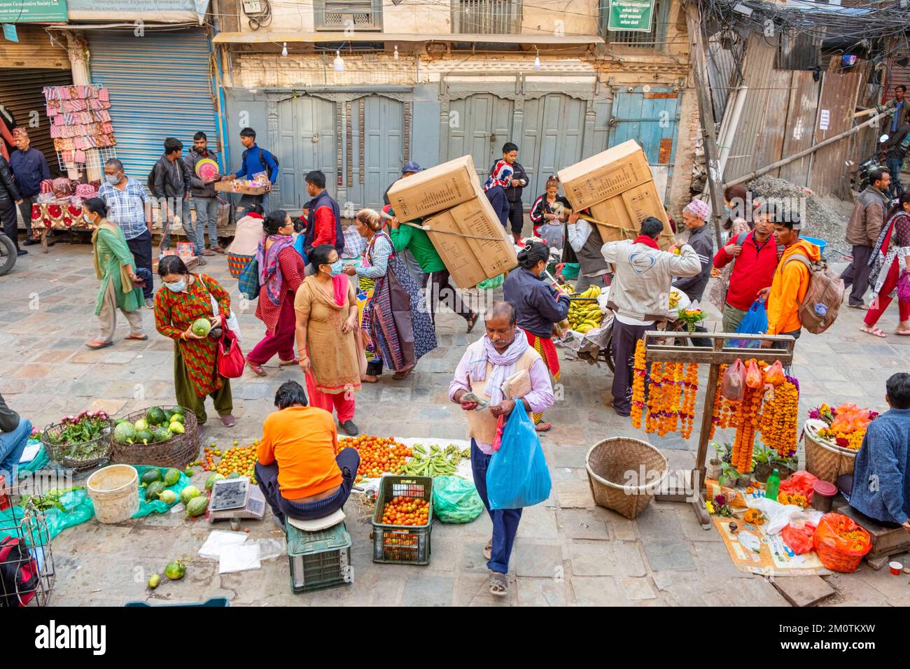 Nepal, Kathmandu, city center near Durbar Square, street vendors set up ...
